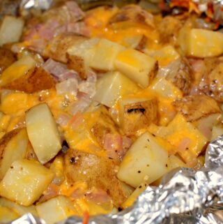 Grilled Cheesy Garlic Potatoes - The Cookin Chicks