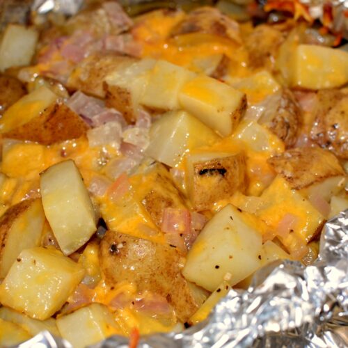 Grilled Cheesy Garlic Potatoes - The Cookin Chicks