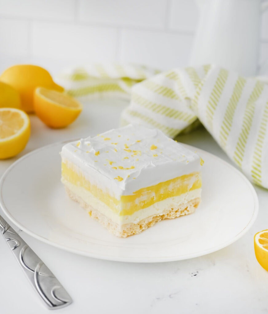 Easy Lemon Lush Recipe (Classic Layered Dessert) - The Cookin Chicks